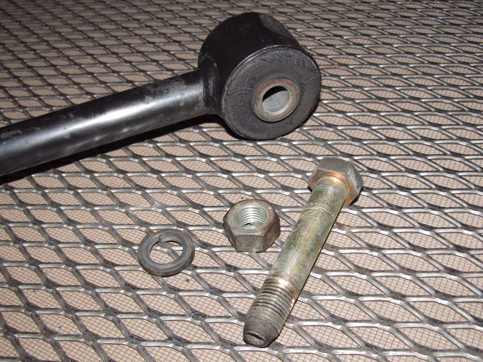 81-83 Mazda RX7 OEM Rear Lower Control Arm Link - Left – Autopartone