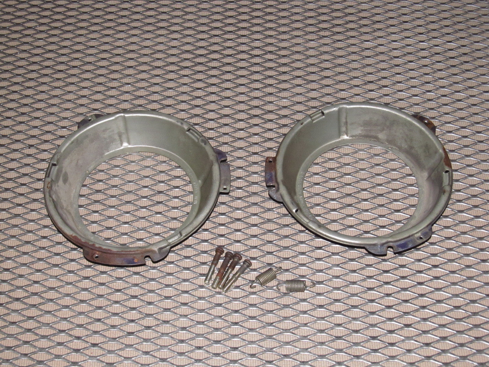 72 73 Datsun 240z OEM Headlight Mounting Bracket - Set – Autopartone