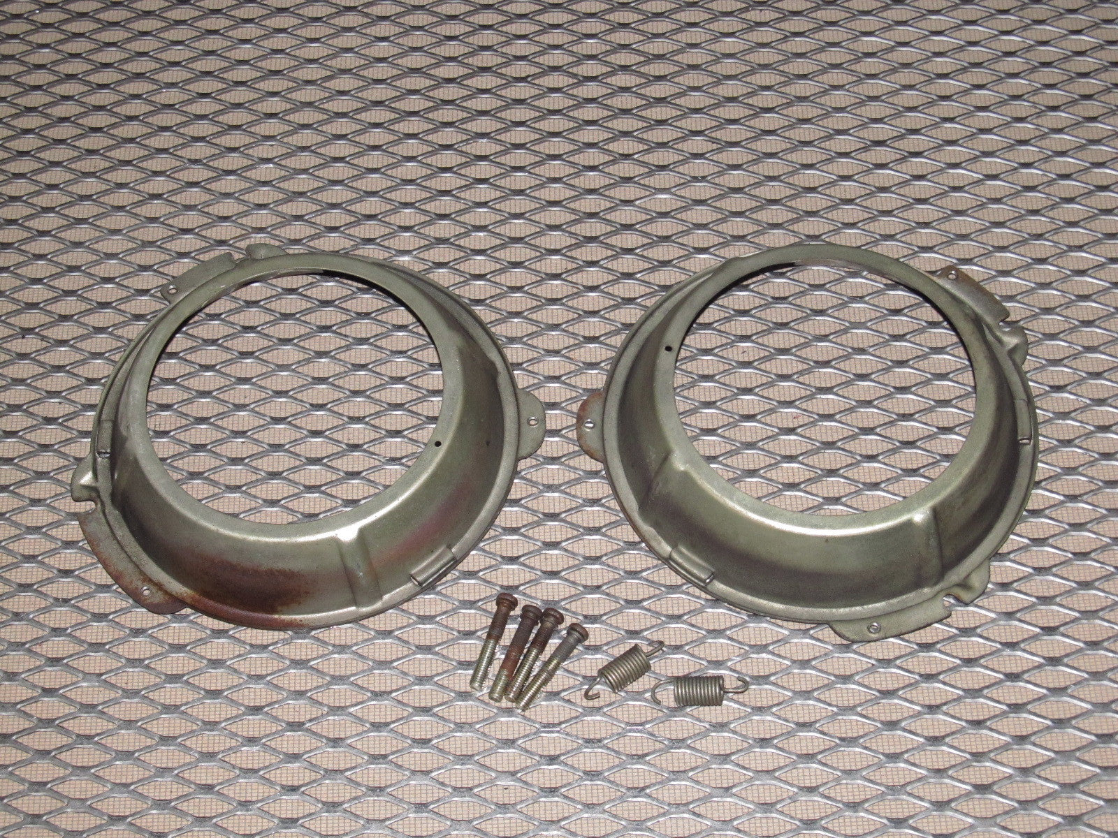 72 73 Datsun 240z OEM Headlight Mounting Bracket - Set – Autopartone