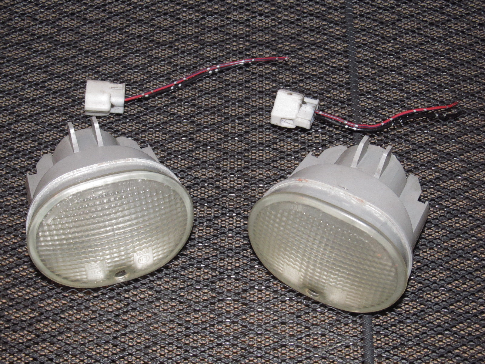 97 98 99 Mitsubishi Eclipse OEM Reverse Light - Set – Autopartone